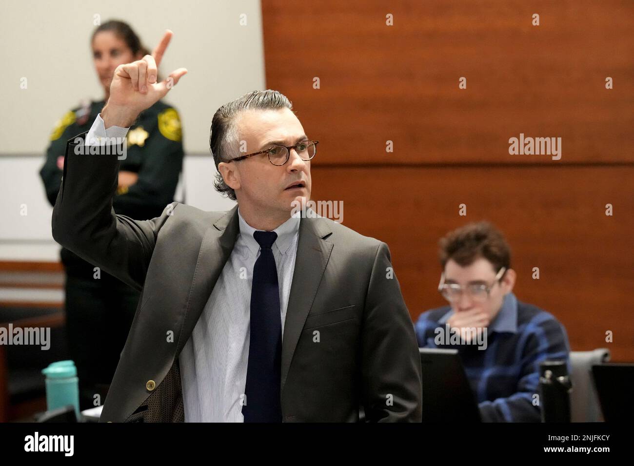 Capital defense attorney Casey Secor motions in court during the ...