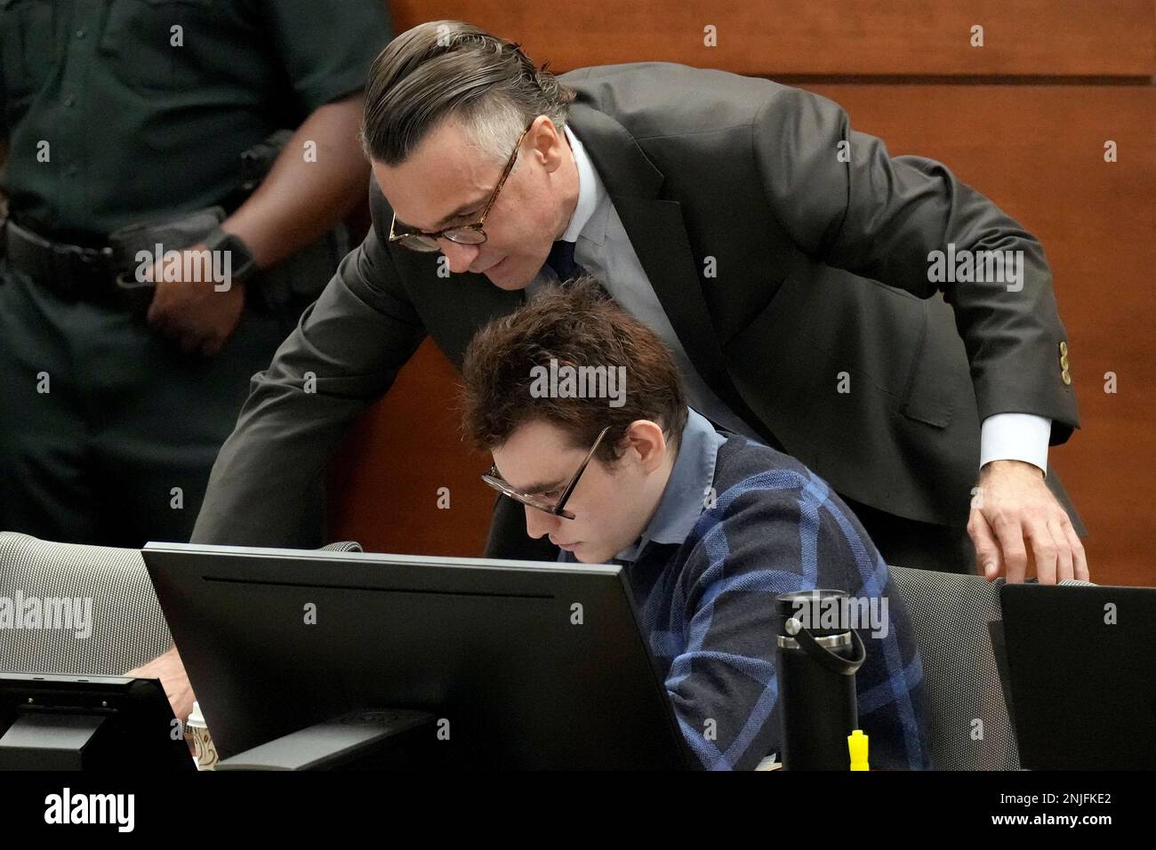 Capital defense attorney Casey Secor, standing, and Marjory Stoneman ...