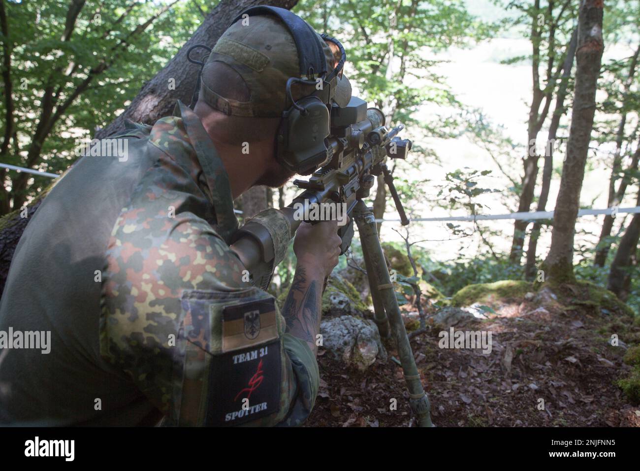 A competitor engages a target during the European Best Sniper Team ...