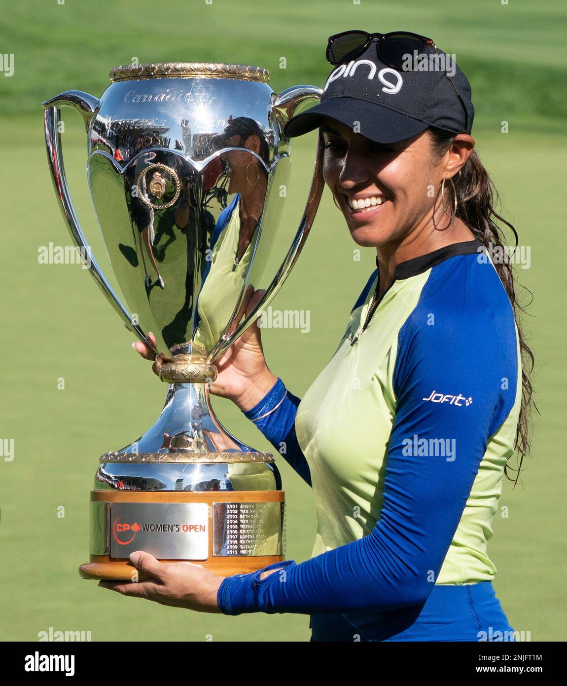 Paula Reto, from South Africa, smiles as she holds the CP Women's Open ...