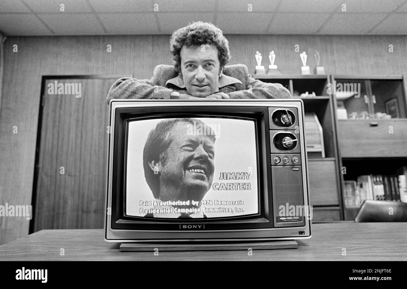 Carter advisor, advertising executive, Gerald Rafshoon perches on a tv ...