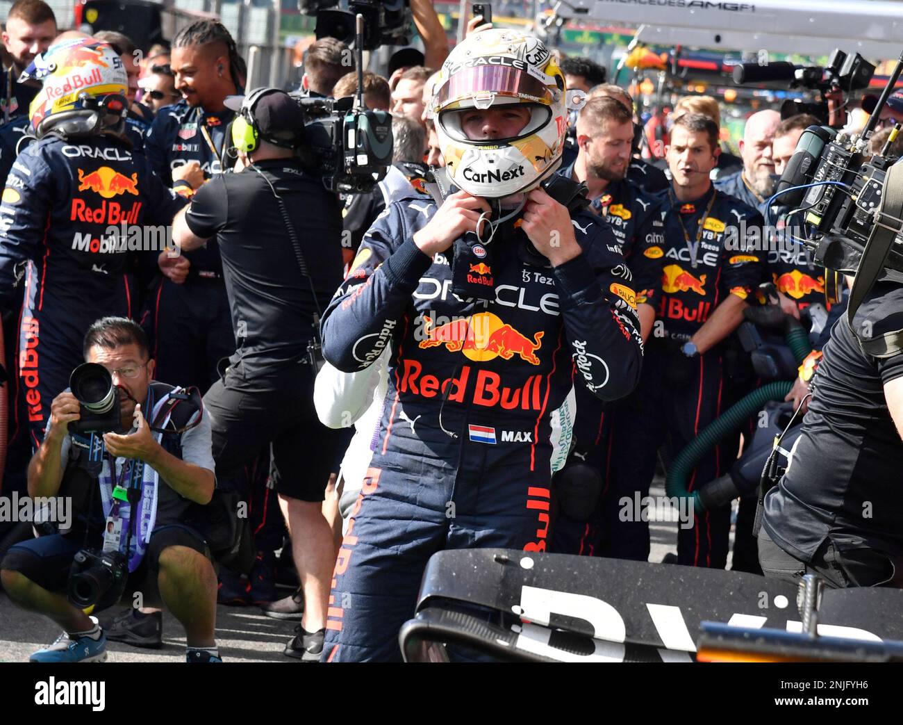 Red Bull driver Max Verstappen of the Netherlands stands in the Parc ...