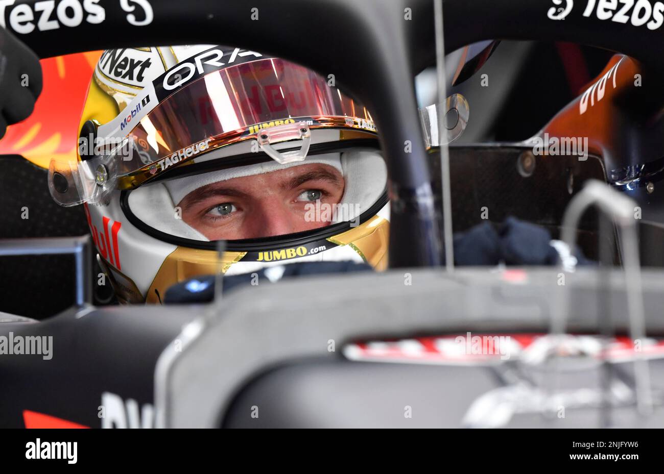 Red Bull driver Max Verstappen of the Netherlands sits in his car ...