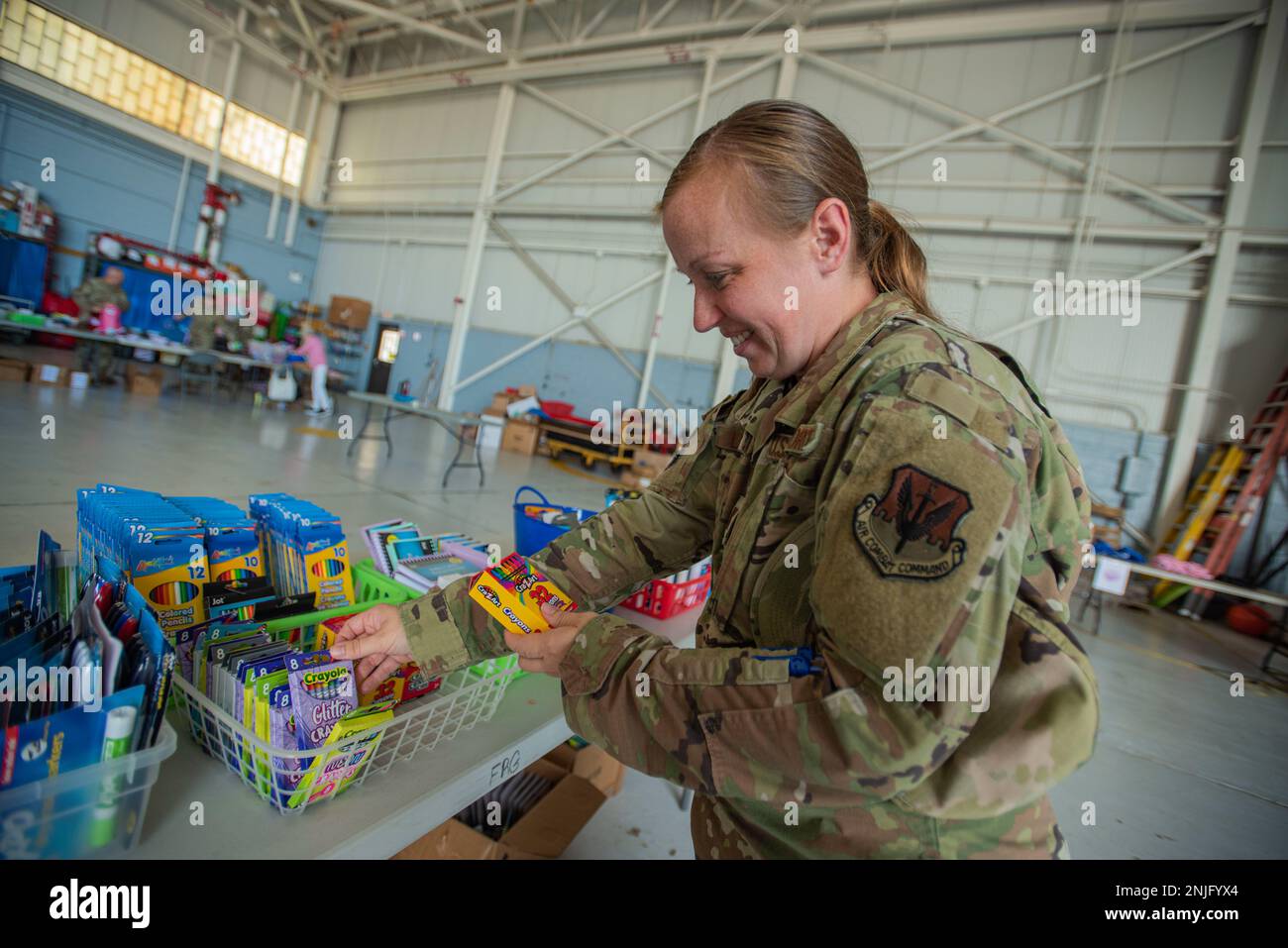 Capt. Sarah Luciano Assistant Staff Judge Advocate selects crayons for ...
