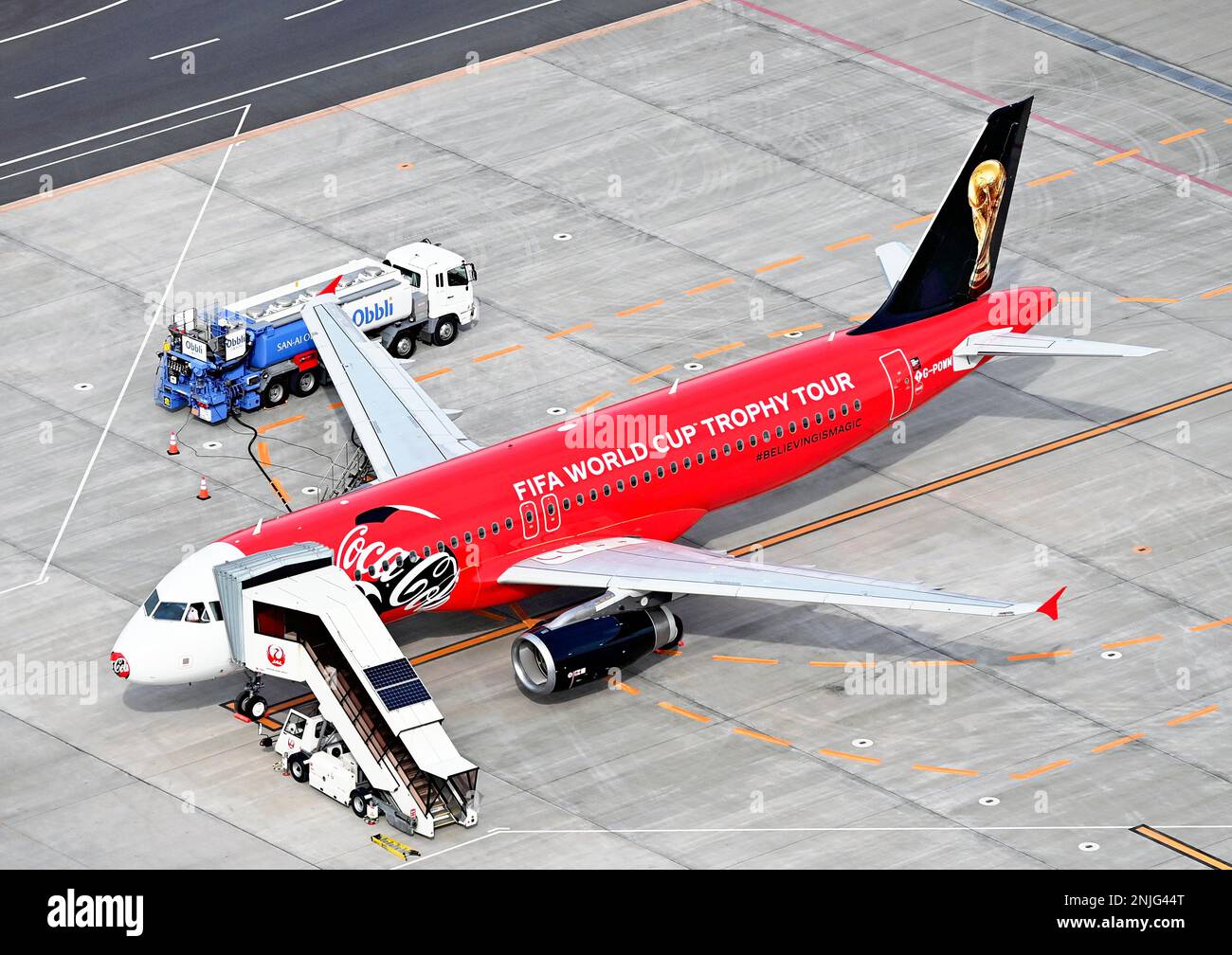 An aerial photo shows the FIFA World Cup Trophy Tour jet, carrying the ...
