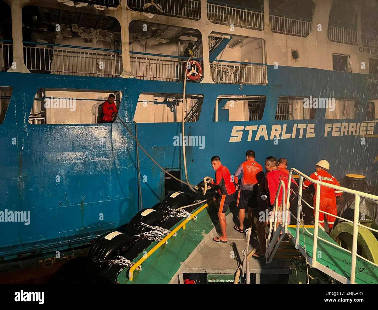 In this handout photo provided by the Philippine Coast Guard, Coast ...
