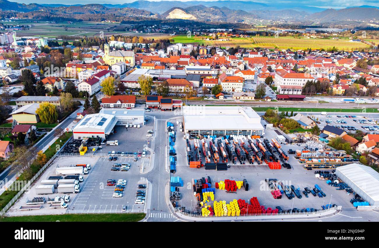 A factory lot with some trucks and outdoor warehouse, drone shot Stock ...
