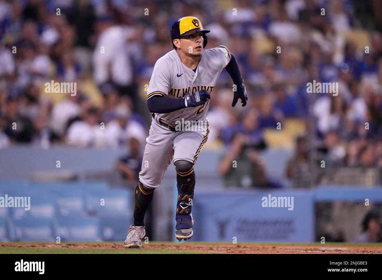 Milwaukee Brewers third baseman Luis Urias (2) runs to first base ...