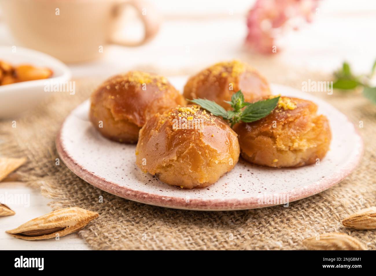 Homemade traditional turkish dessert sekerpare with almonds and honey ...