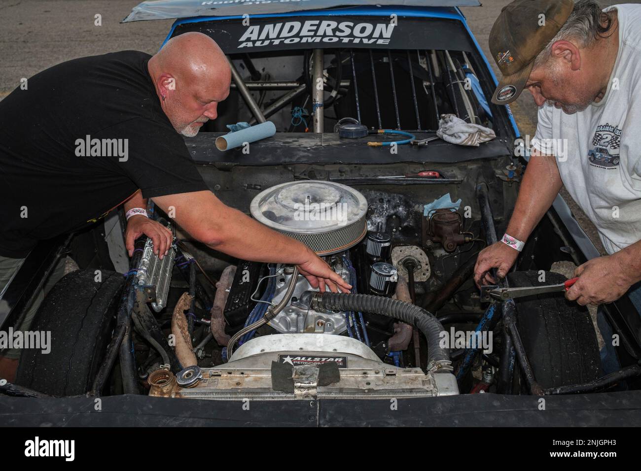 Derek Parrott (left) and Jeff LaCoursiere (right) look over Parrott's ...