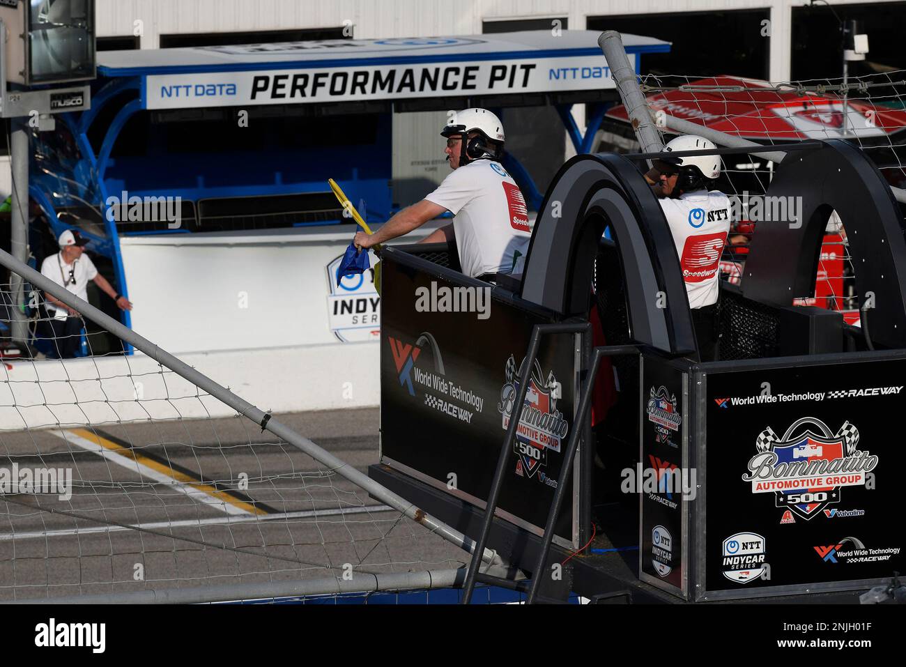 MADISON, IL - AUGUST 20: The flagman show the field crossed flags ...