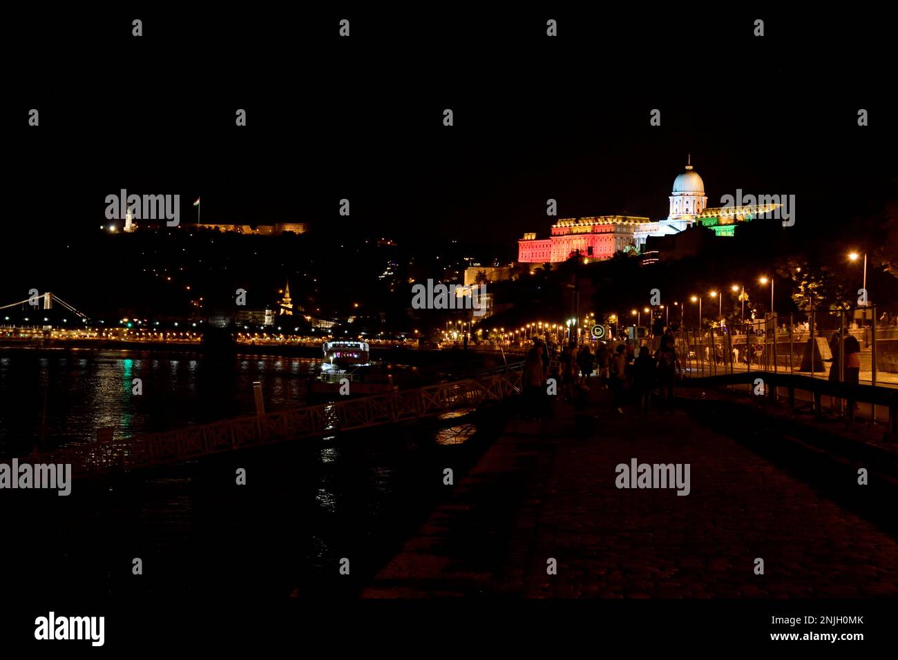 The colors of the Hungarian flag illuminate the royal Buda Castle to ...