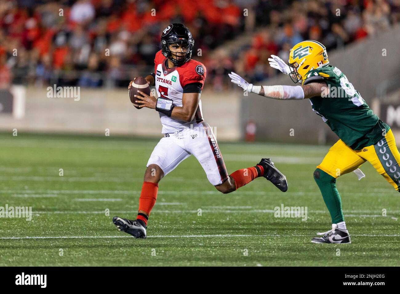 OTTAWA, ON - AUGUST 19: Ottawa Redblacks quarterback Caleb Evans (5 ...