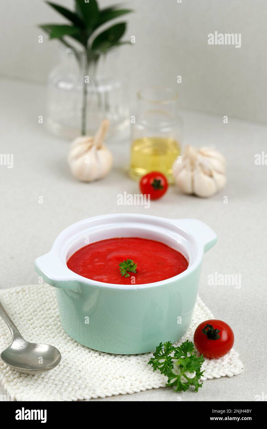 Tomato Soup in a Bowl with Parsley Topping Stock Photo - Alamy