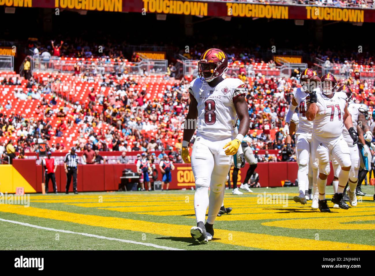 Washington Commanders running back Brian Robinson (8) celebrates his ...