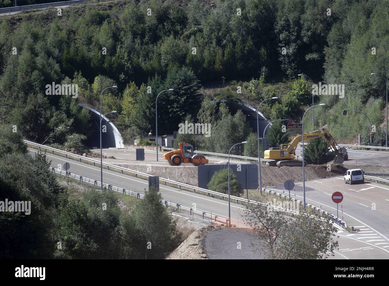 Operators and cranes work during the dismantling of the third and last ...