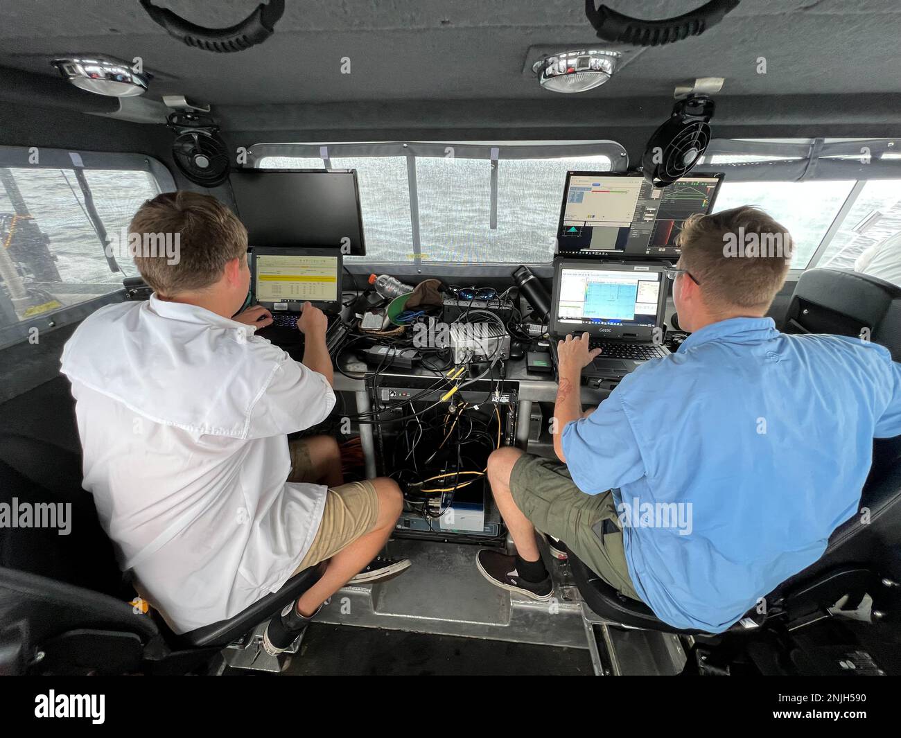 STENNIS SPACE CENTER, Miss.— Fleet Survey Team (FST) Sailors and a ...