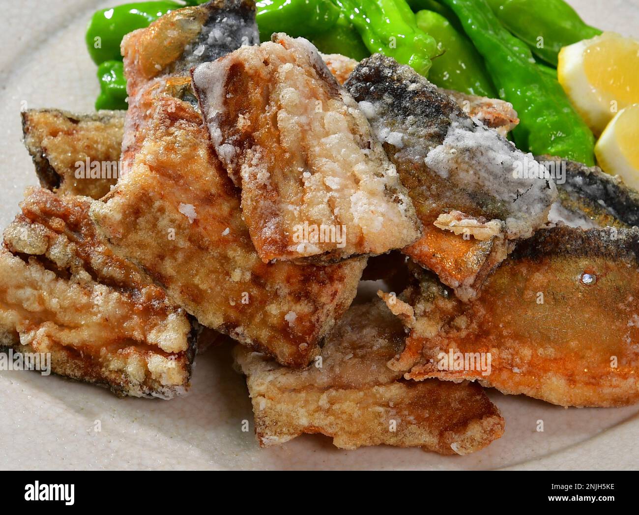 A picture shows a dish of deep fried saury in Tokyo on August 2, 2022 ...