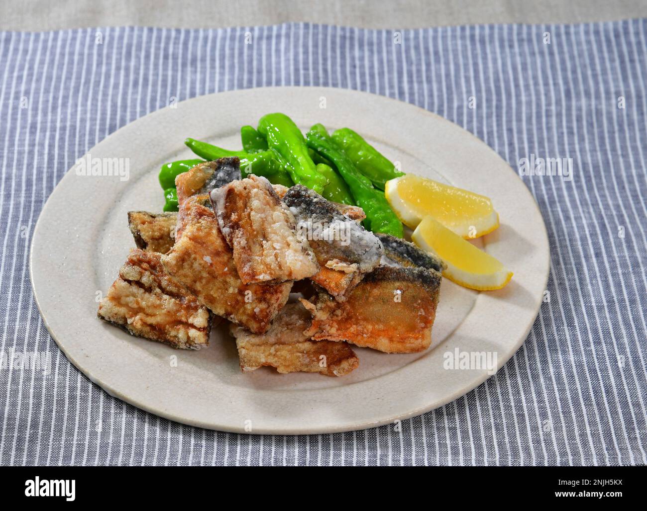 A picture shows a dish of deep fried saury in Tokyo on August 2, 2022 ...