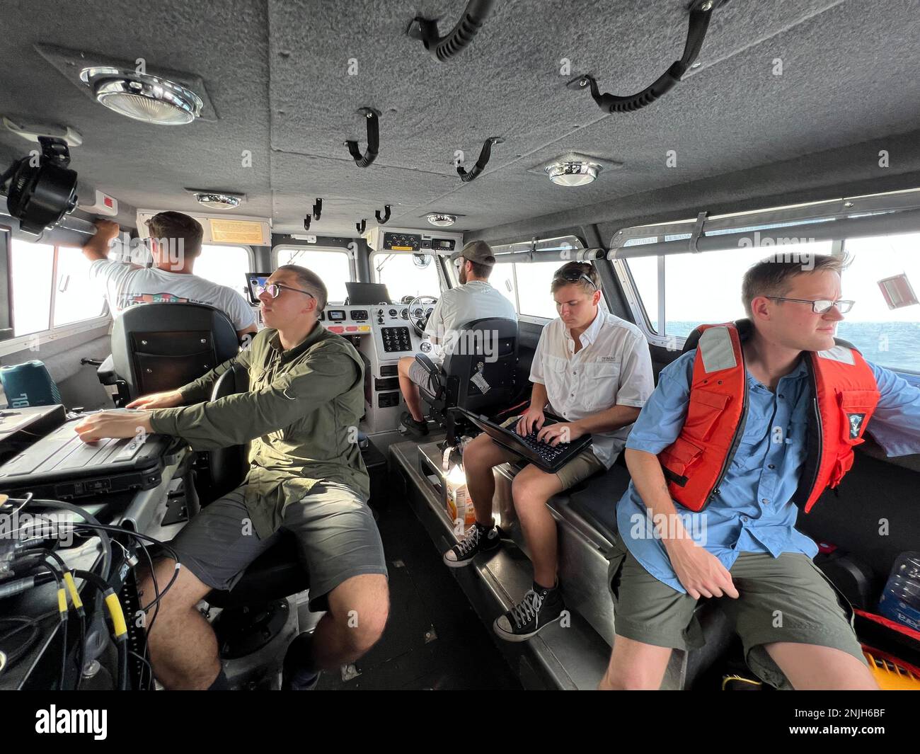 STENNIS SPACE CENTER, Miss.— Fleet Survey Team (FST) Sailors and a ...