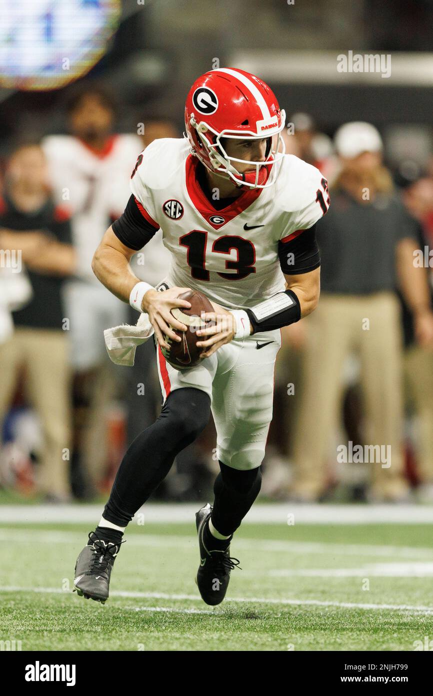 Georgia quarterback Stetson Bennett (13) runs during the Southeastern ...