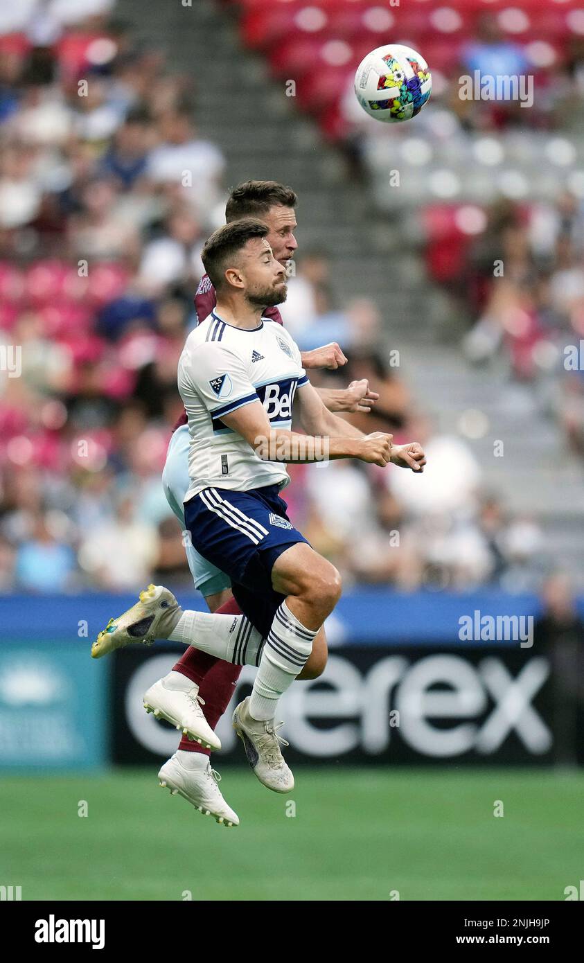 Vancouver Whitecaps' Marcus Godinho, front, and Colorado Rapids' Keegan ...