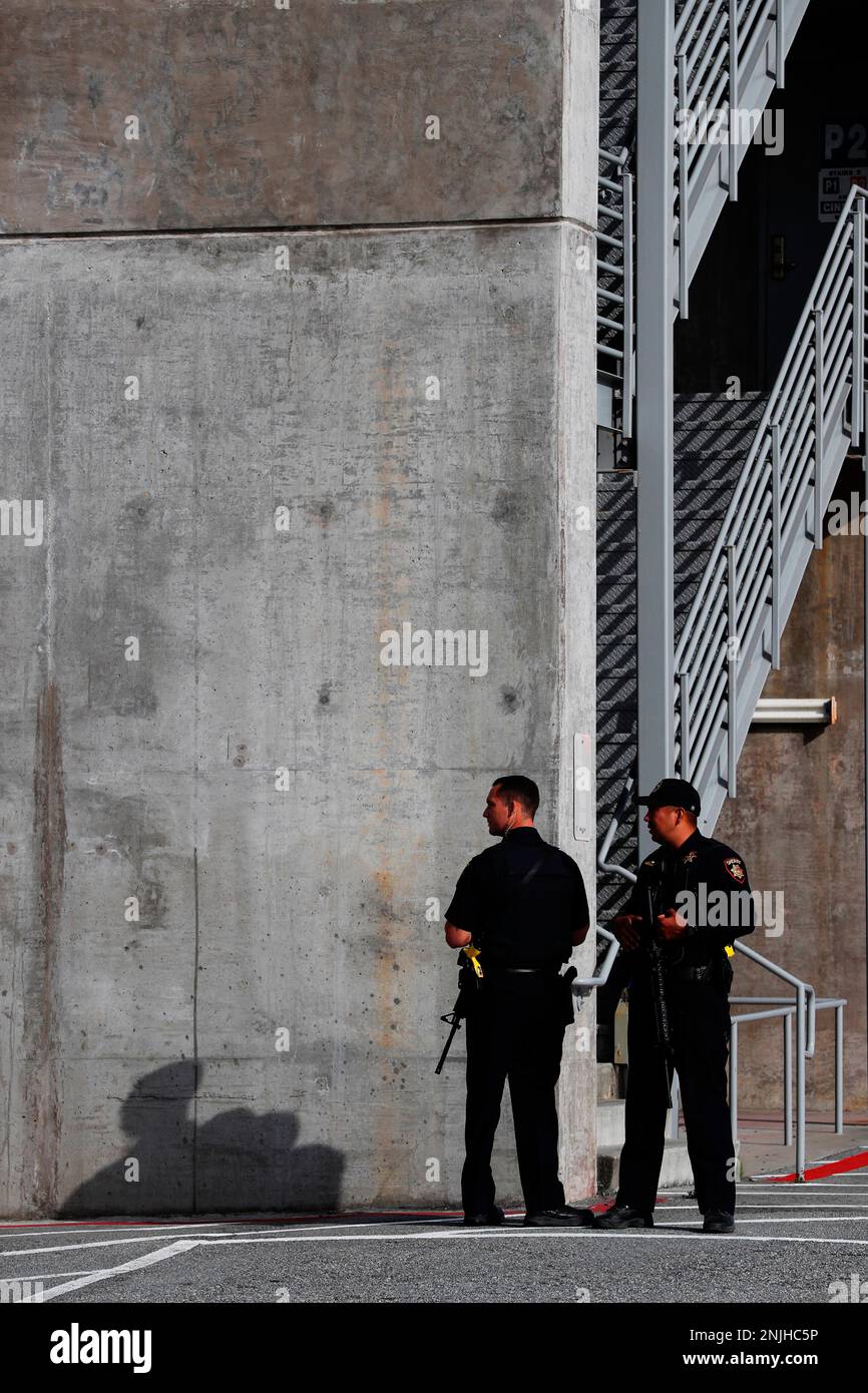 Police officers stand outside the Century Theaters building at Tanforan ...