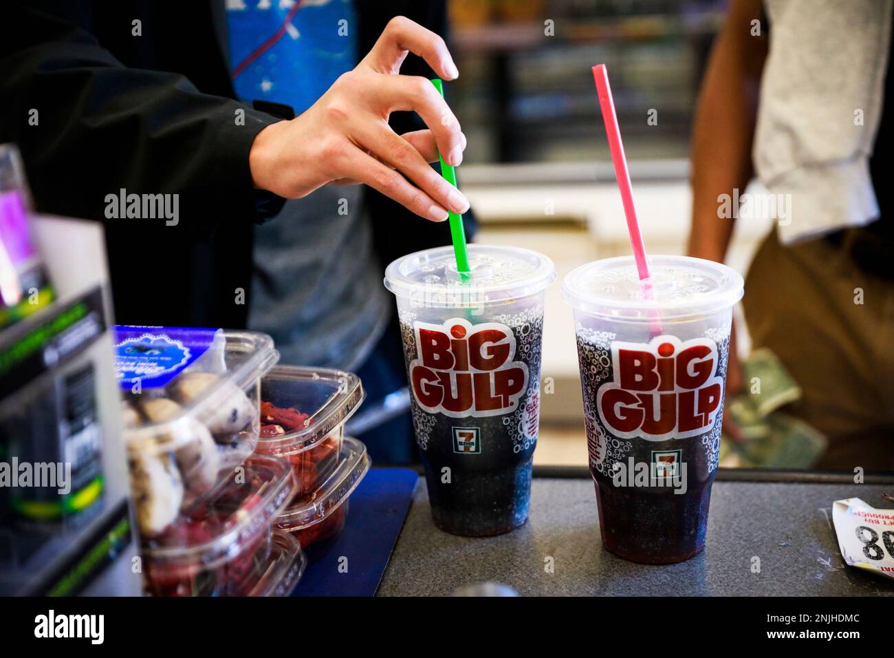 Carlos Ramirez, 16, puts a straw in his Big Gulp soda while purchasing ...