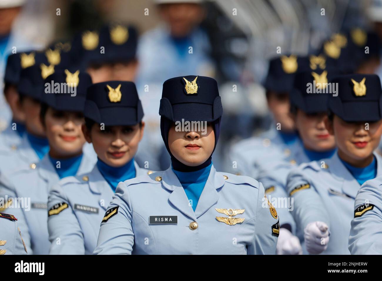 Members of Indonesian Air Force take part in a ceremony marking the ...