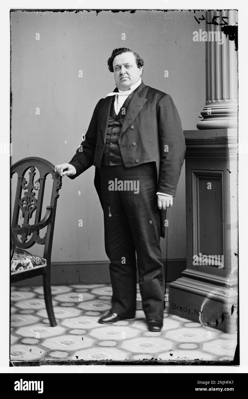 Rev. Canfield, a 19th-century religious leader, captured in a formal ...