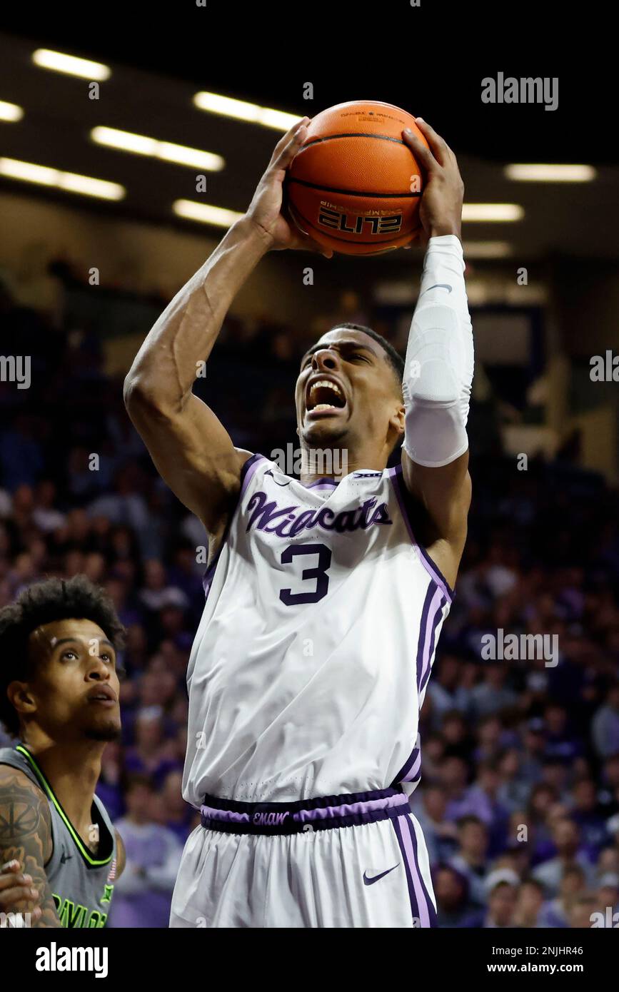 Kansas State forward David N'Guessan (3) rebounds the ball against ...
