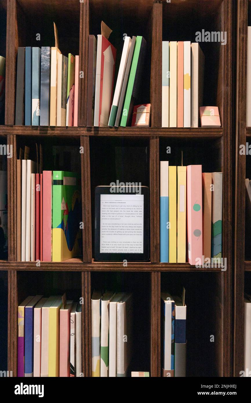 books and ebook device Stock Photo - Alamy