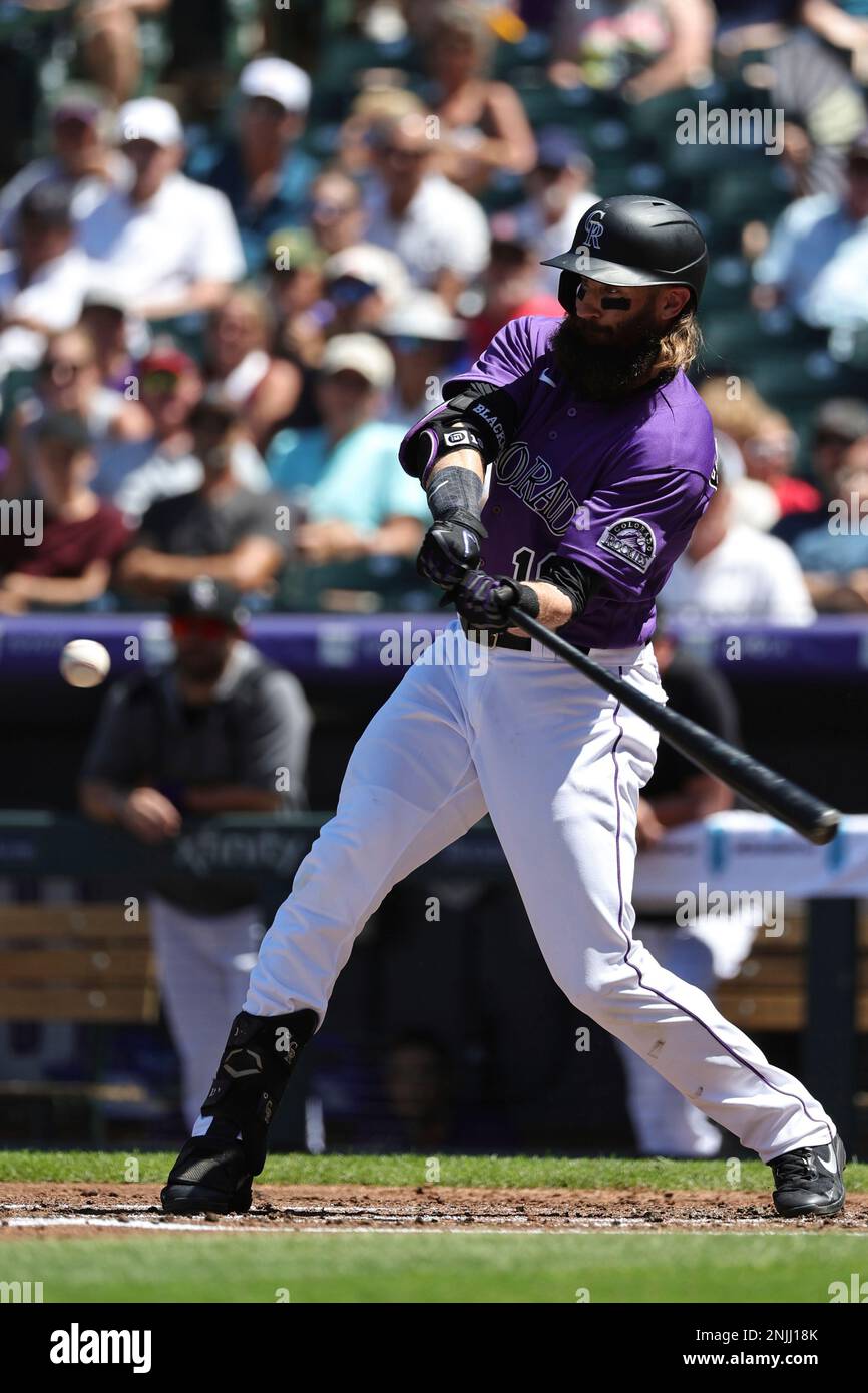 Colorado Rockies designated hitter Charlie Blackmon (19) swings at the ...