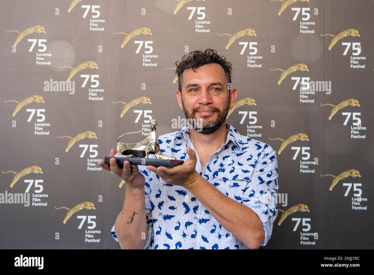 Actor Reinaldo Amien Gutierrez poses with the Pardo for best Actor ...