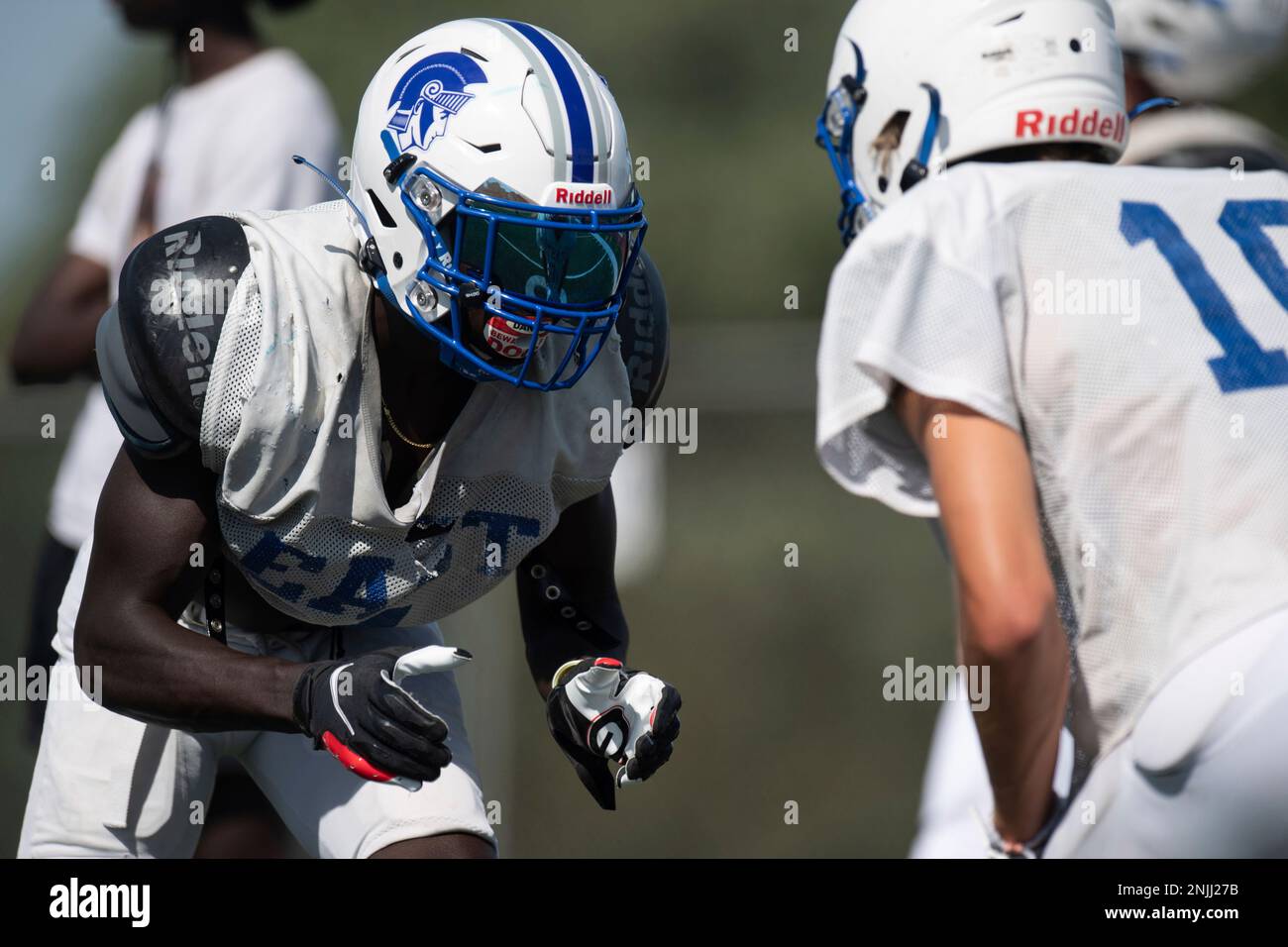 Malachi Coleman, left, participates in a drill during a Lincoln East ...