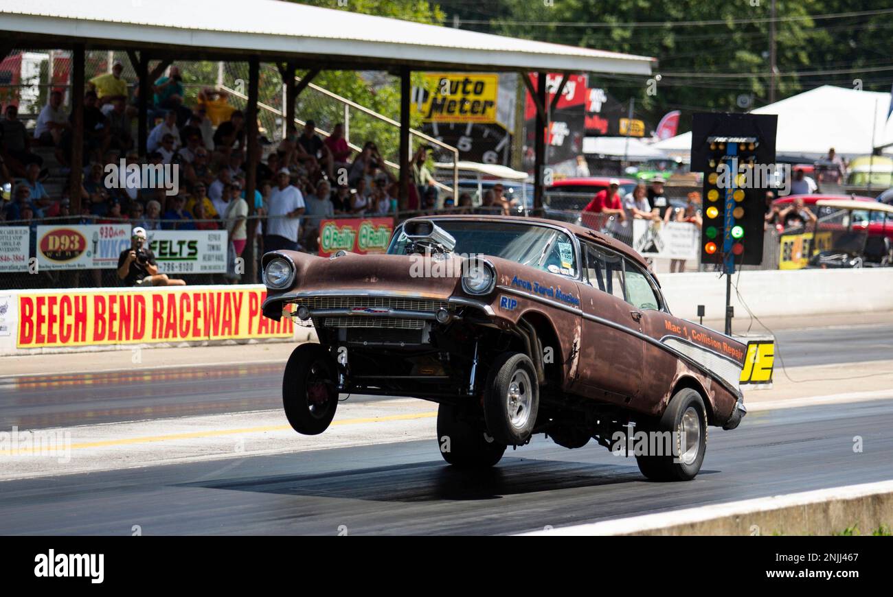 The front tires of Aron Jarel Macke's car lift off the pavement as he ...