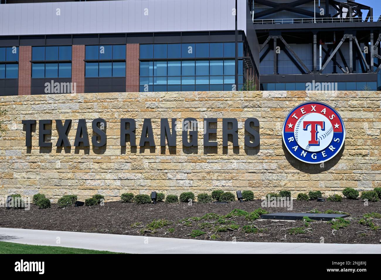 The Texas Rangers name and logo are seen outside of Globe Life Stadium ...