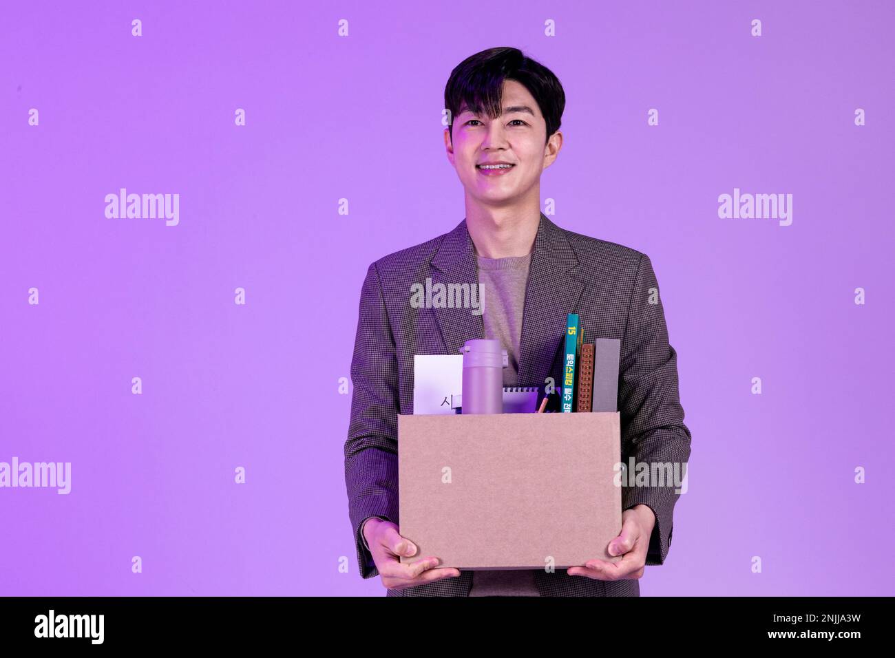 handsome Korean young man quitting job Stock Photo - Alamy