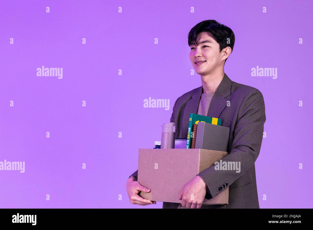 handsome Korean young man quitting job Stock Photo - Alamy