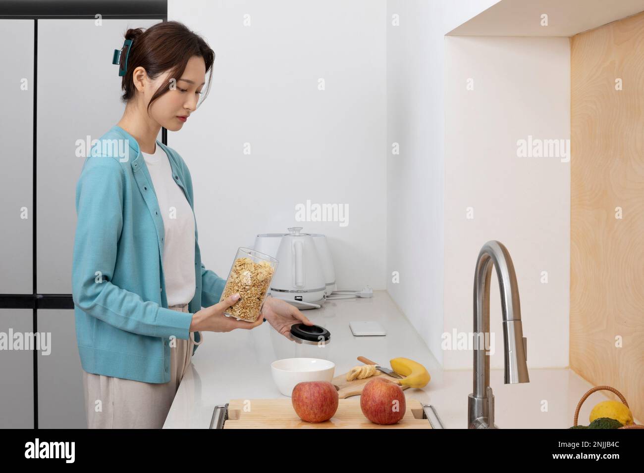 Korean woman cooking hi-res stock photography and images - Alamy