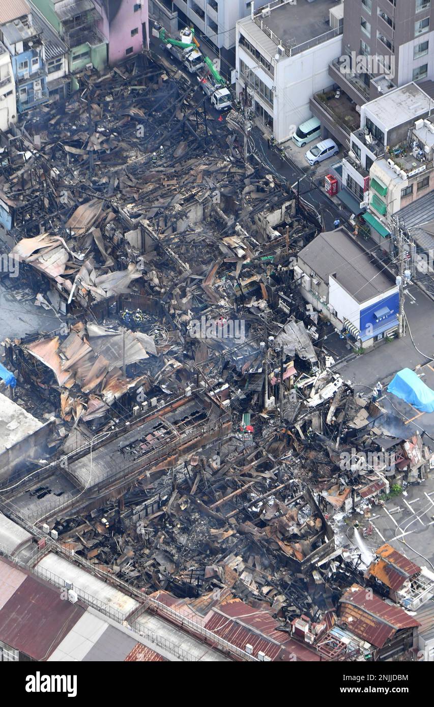 An aerial photo shows scars of a massive fire at the Tanga Market in ...