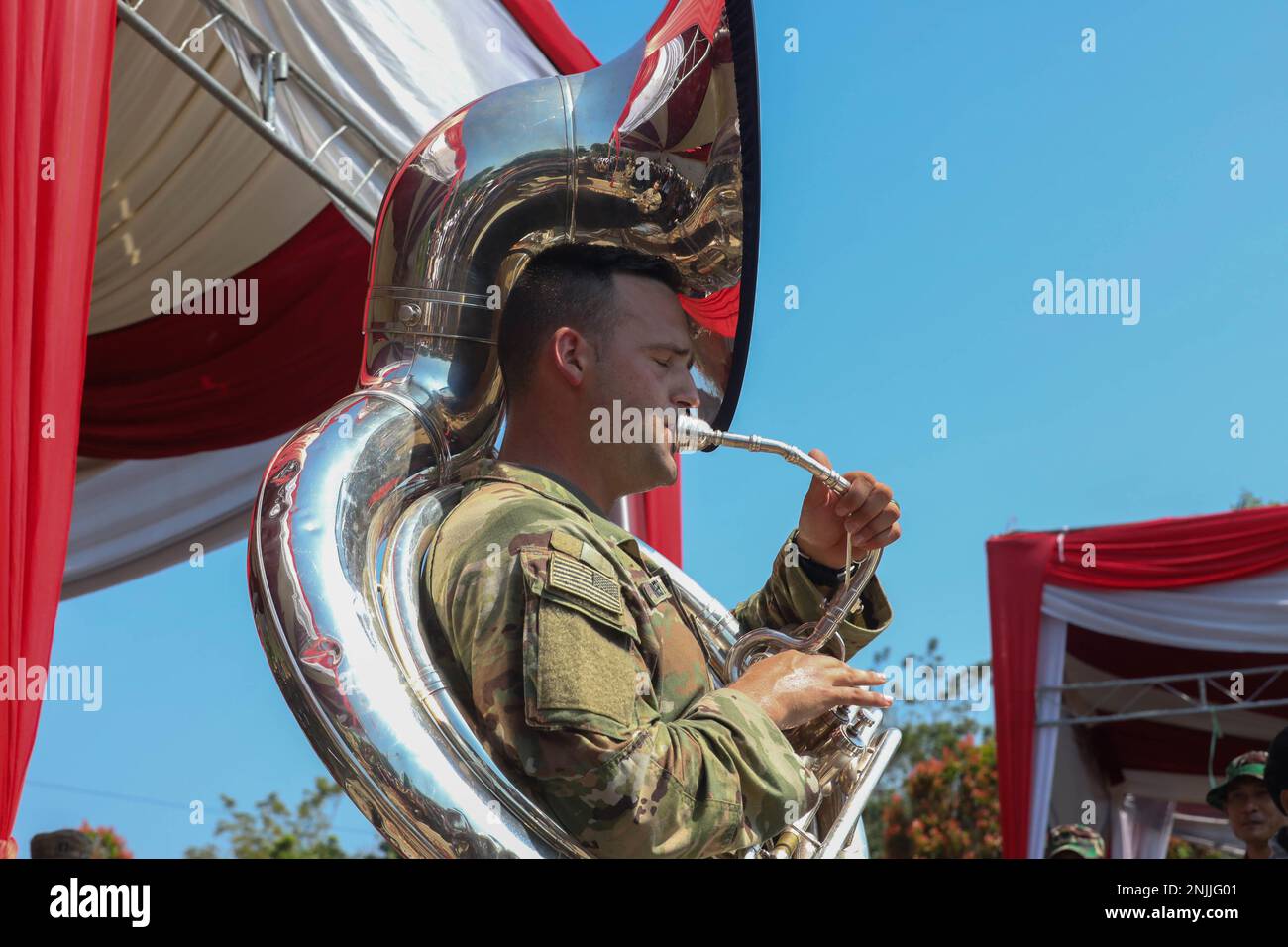 U.S. Army Staff Sgt. Dustin Roberts, a musician assigned to the Tropic ...