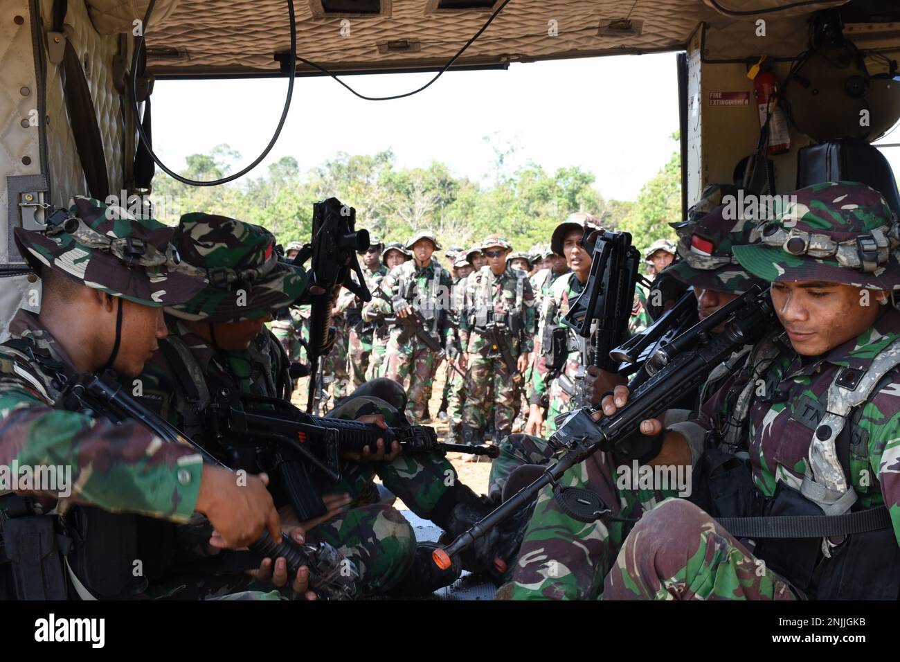 TNI soldiers demonstrate loading practice into the Bell 412EP ...