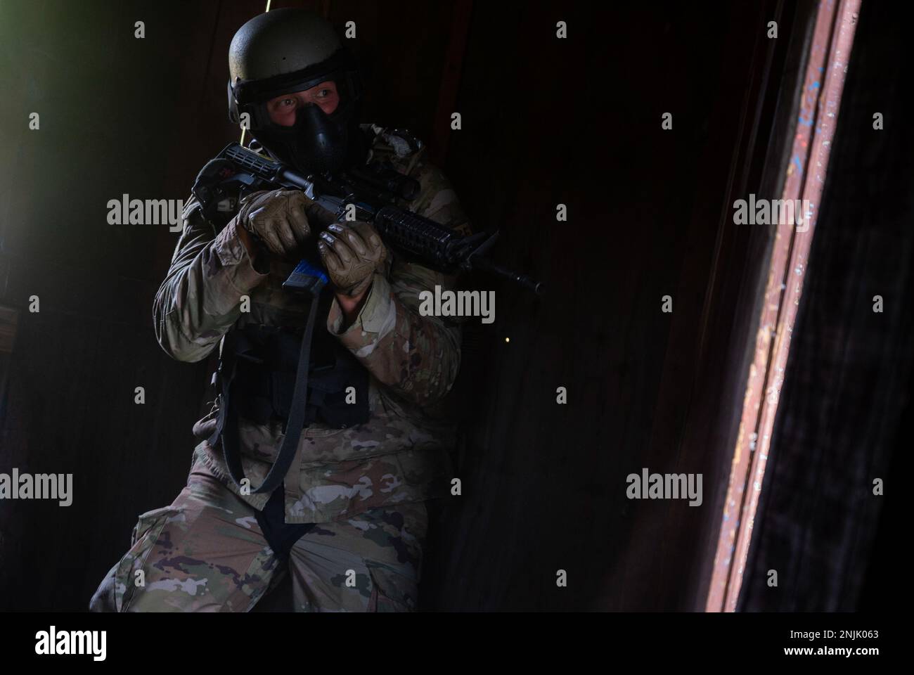 A U.S. Air Force Airman provides security during Fieldcraft Hostile at ...