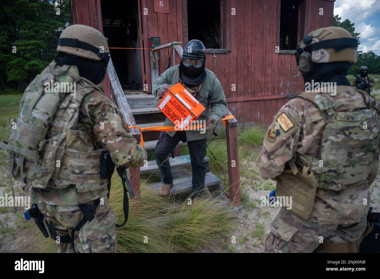 U.S. Air Force Airmen recover a sensitive item during Fieldcraft ...