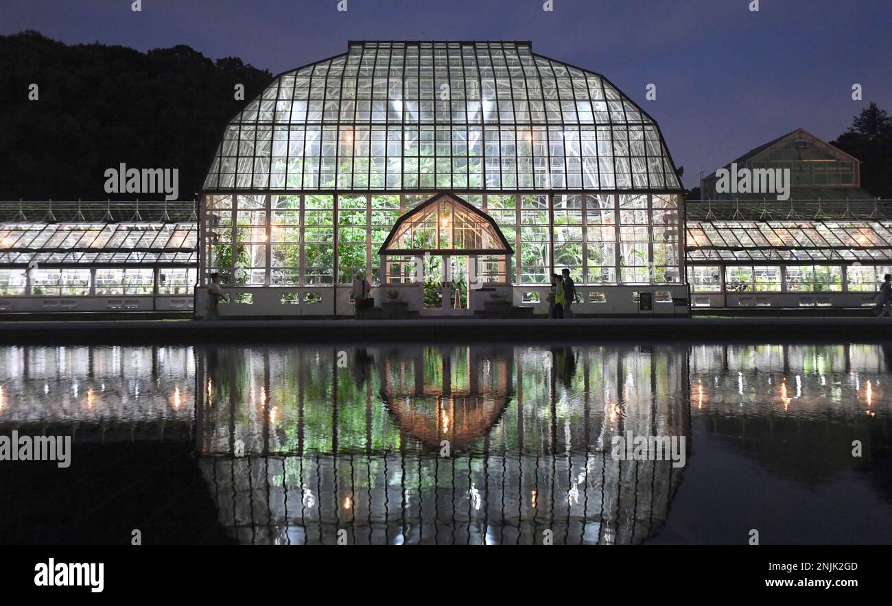 A greenhouse is illuminated at the Higashiyama Botanical Garden in ...
