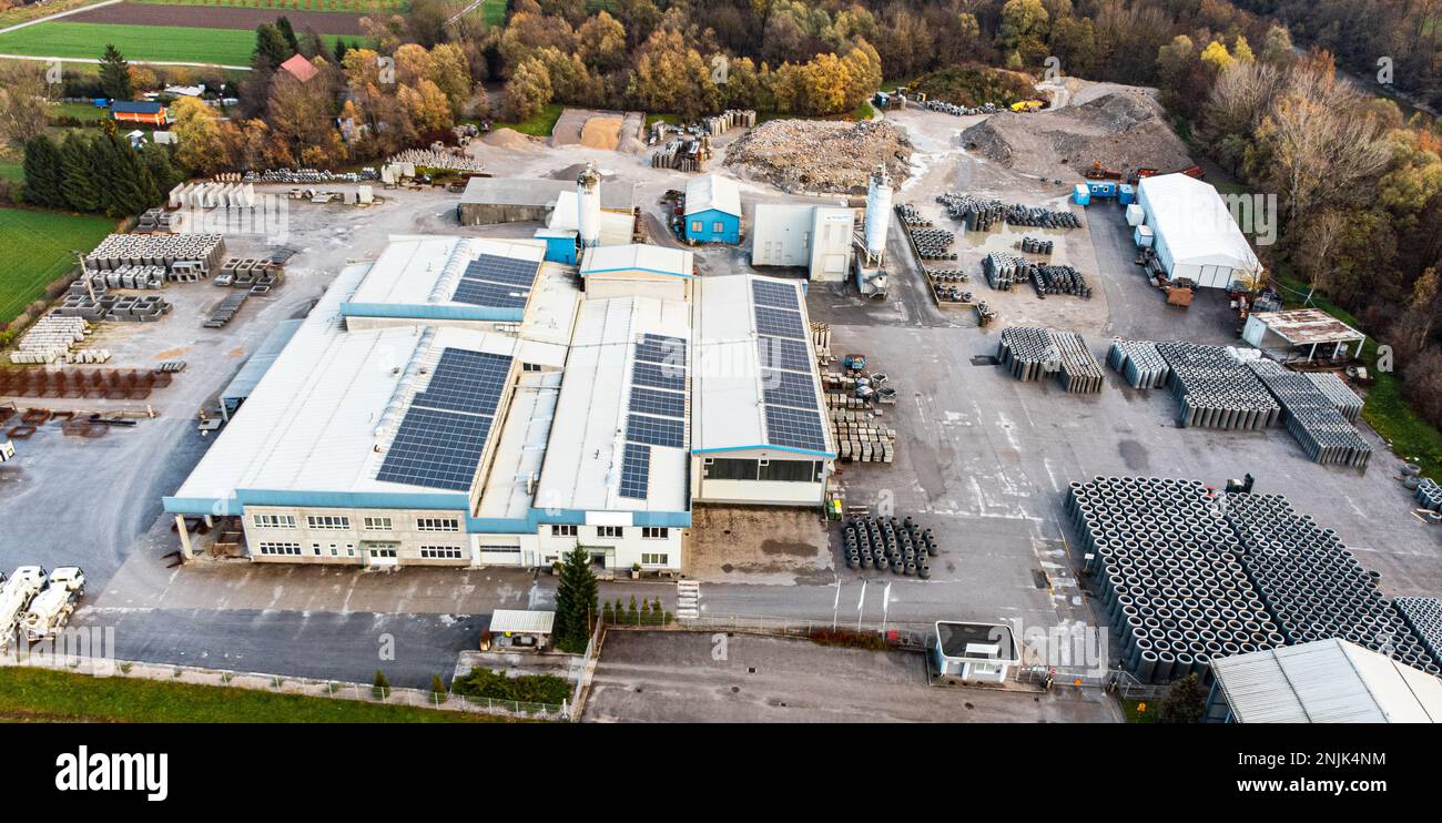 Factory that produces concrete products like tiles, concrete pipes and ...