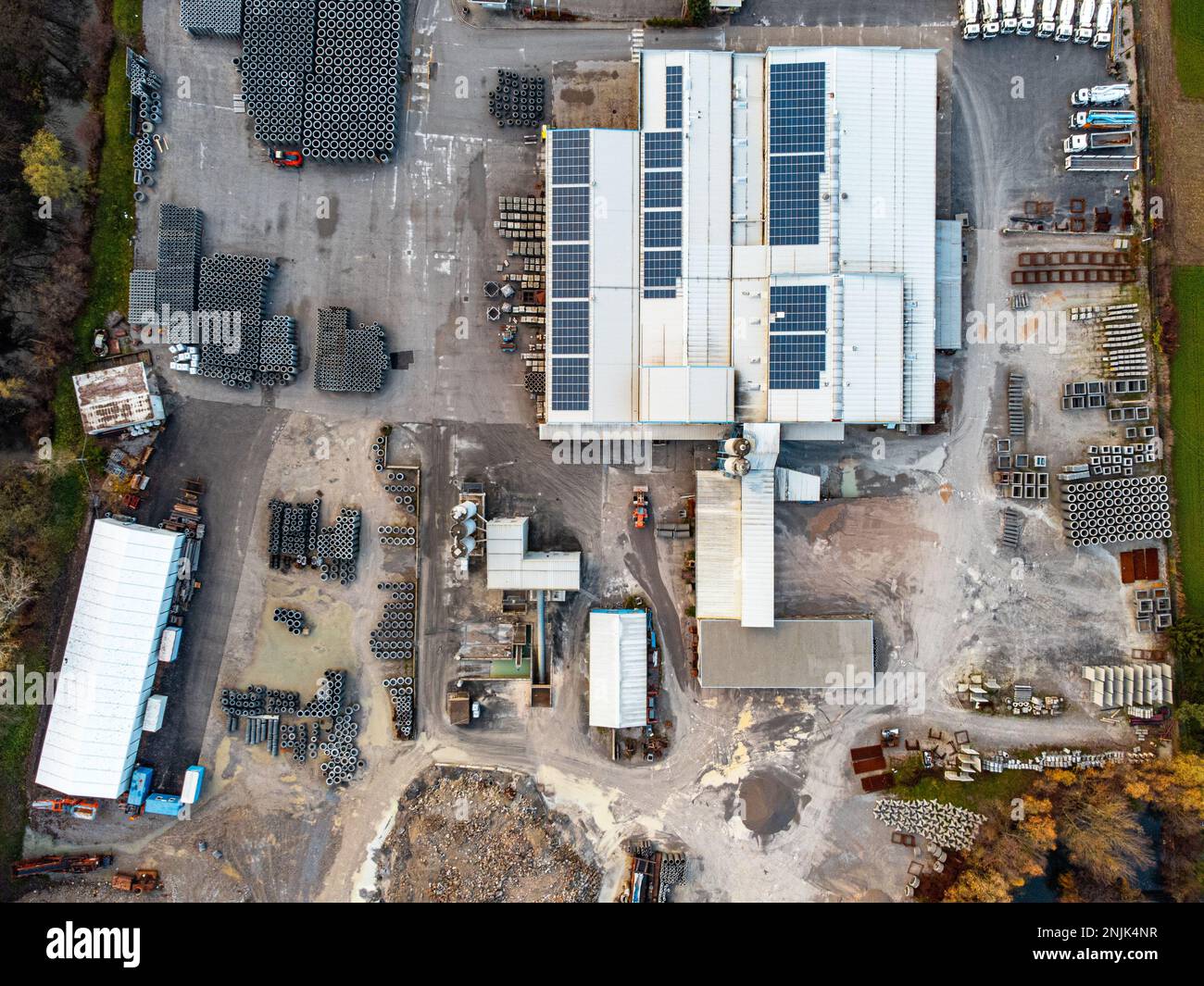 Factory that produces concrete products like tiles, concrete pipes and ...