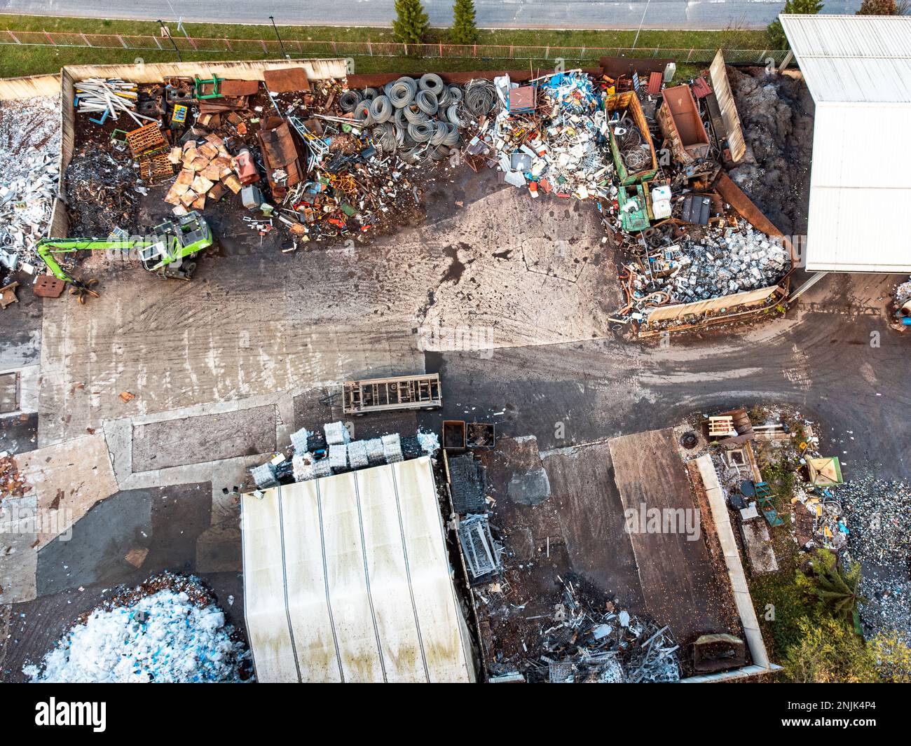Aerial view on a waste disposal dump in Slovenia. Large piles of metal ...