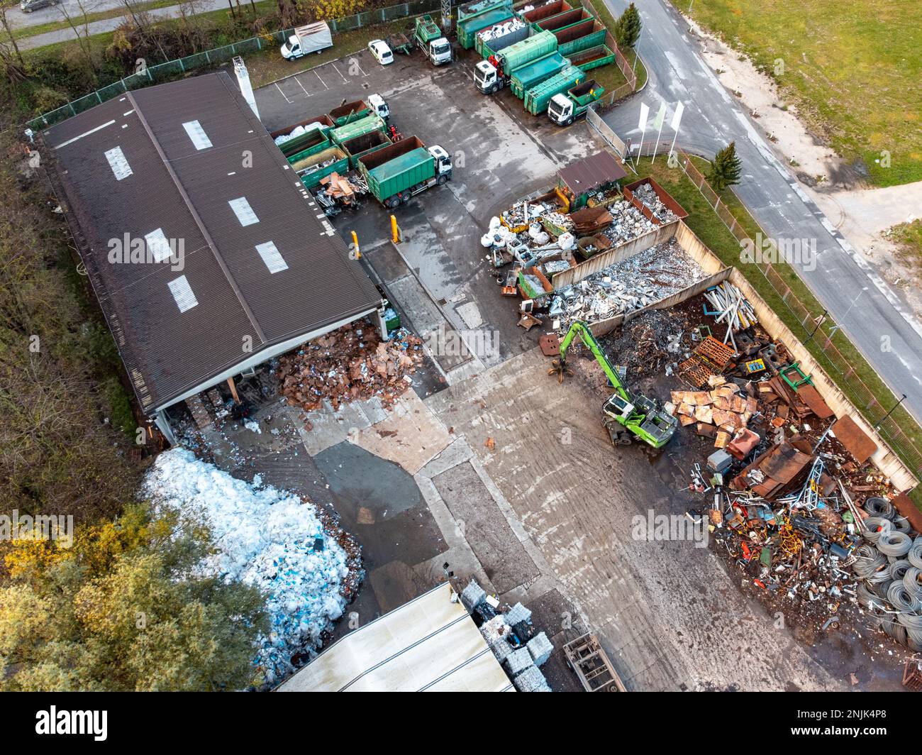 Aerial view on a waste disposal dump in Slovenia. Large piles of metal ...